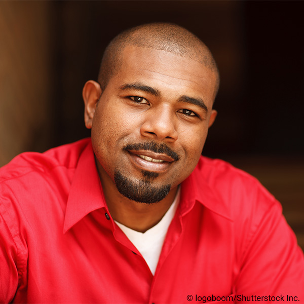 close-up of a man in a red shirt hero inset | National Institute of Justice