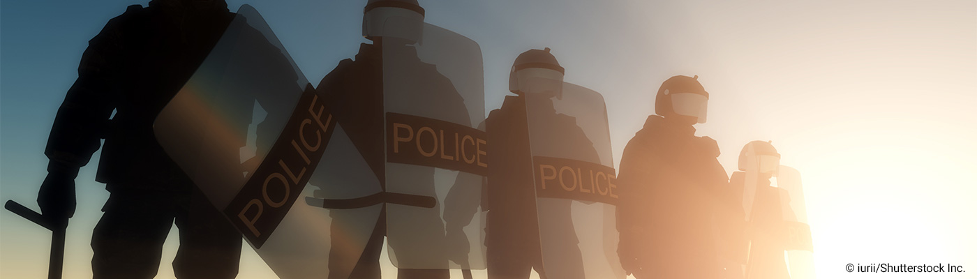 Police officers lined up in riot gear hero background | National ...