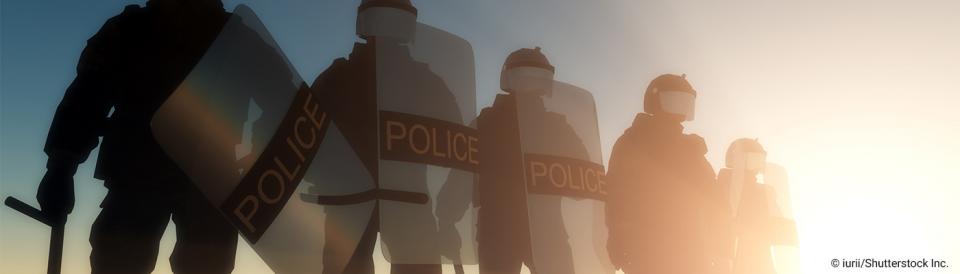 Police officers lined up in riot gear hero background | National ...